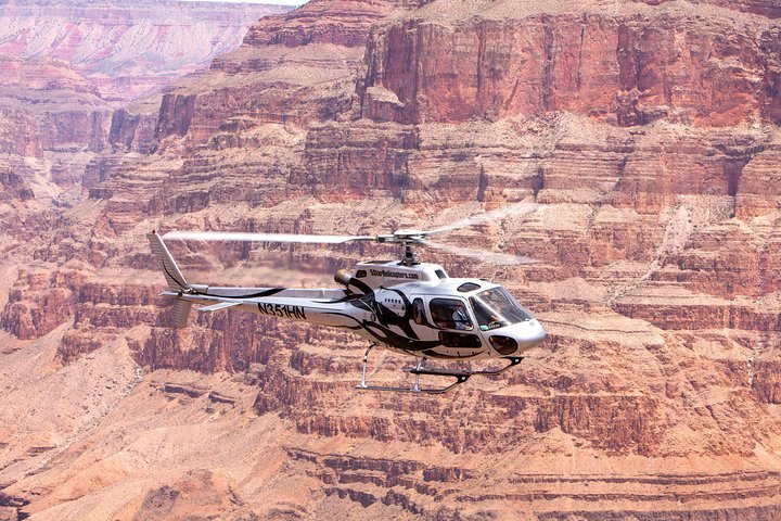Tiket Grand Canyon Helicopter Flight with Sunset Valley of Fire Landing ...