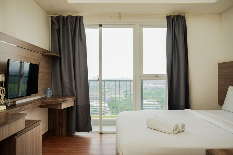 Comfort and High Floor Studio Room at Casa de Parco Apartment By ...